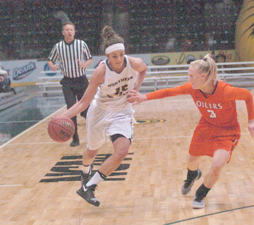 Helping those in need: Northern Michigan University coach, athlete lose ...